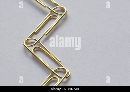 paperclips in a chain joined together in zig zag pattern Stock Photo ...