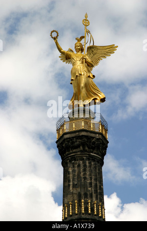 The gilded statue of Victory on the Siegessaule column in Berlin ...