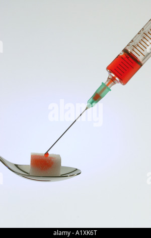 Sugar cube, needle point Stock Photo - Alamy
