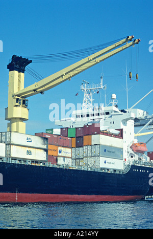 A crane moves a shipping container at the Port of Savannah in Georgia ...