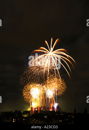 Fireworks explode over Edinburgh Castle during the Hogmanay New Year ...