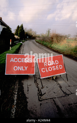 Access only road closed red signs road works up restricted no entry ...