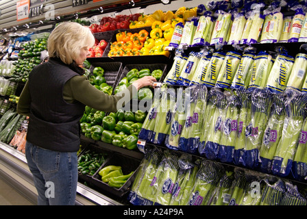 Consumer shops in a modern food super market for food Stock Photo - Alamy