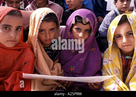 Young Balochi girls wearing traditional embroidered dress from Awaran ...