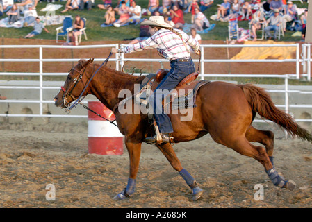 Female cowboy Compete in Rodeo Barrel Competition Stock Photo - Alamy