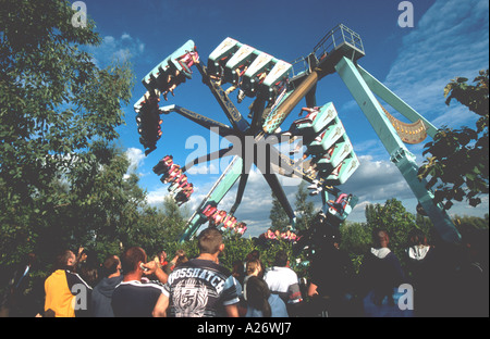 Visitors in queue watch Vortex ride at Thorpe Park adventure centre ...