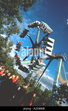 Visitors in queue watch Vortex ride at Thorpe Park adventure centre ...