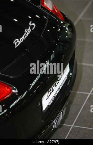 Rear view of a black Porsche sports car with large spoiler and special ...