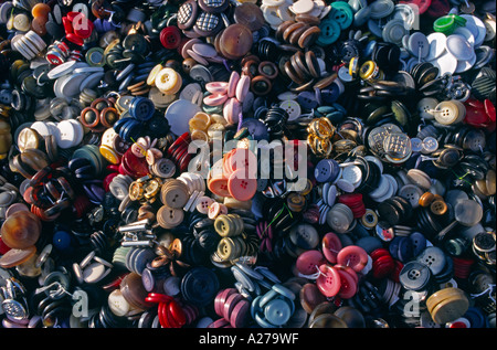 Buttons in many different colours, shapes, and sizes, view from above ...
