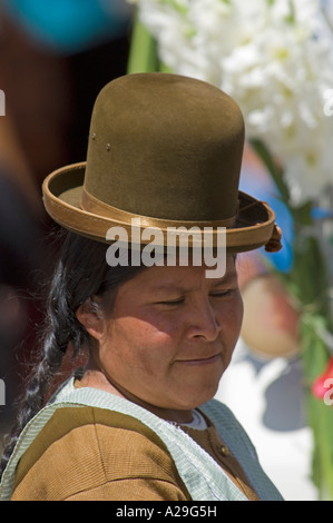 Traditional Bolivian woman wearing a bowler hat in Llallagua, Potosi ...