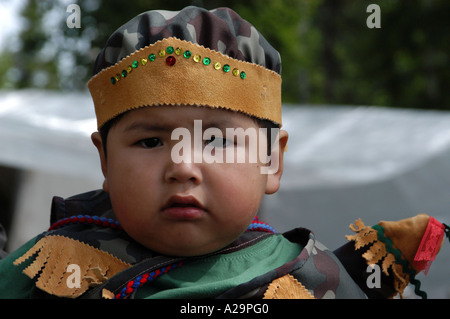 Native cree Baby in traditional costume next to James bay Quebec canada ...