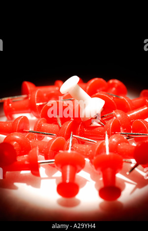 Red push pin standing out on cork bulletin board Stock Photo - Alamy