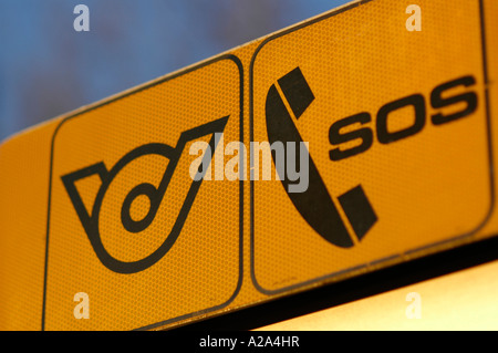 SOS Save Our Souls Emergency telephone sign Stock Photo - Alamy