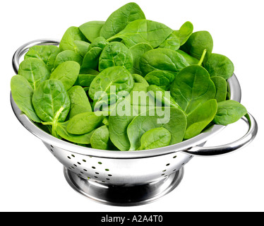 Colander with fresh spinach leaves on white background Stock Photo - Alamy