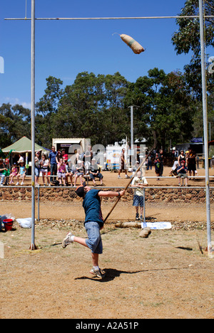young man tossing the sheaf Stock Photo - Alamy