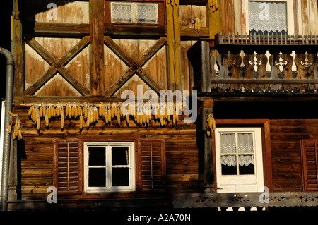 traditional farmhouse with corn drying on the facade Stock Photo - Alamy