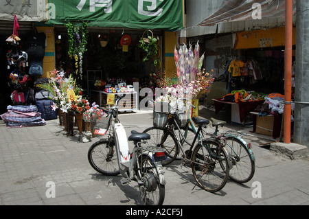 Bikes outside local shop, Chengdu China Stock Photo - Alamy