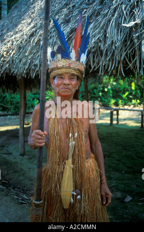 The chief of an Indian Yagua Tribe living near Iquitos with children ...