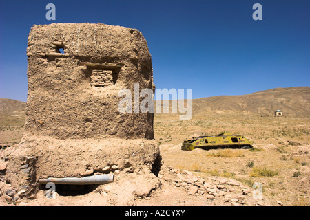 AFGHANISTAN Ghazni Military graveyard with ancient city walls and ...