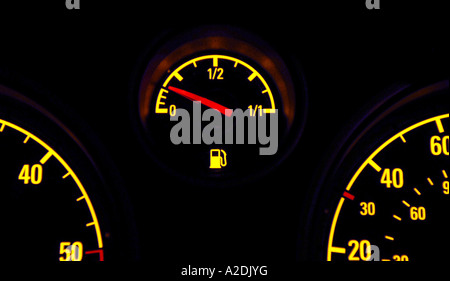 A BRITISH CAR FUEL GAUGE SHOWING LOW FUEL WITH RED WARNING LIGHT,UK ...