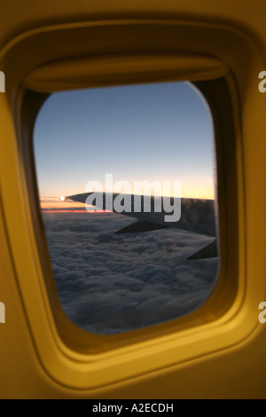 View of a sunset from the window of an easyJet Airbus A320 plane over ...