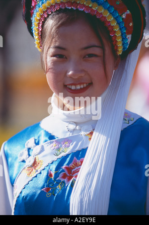 Bai woman wearing a colourful traditional Bai costume, Dali, Yunnan ...