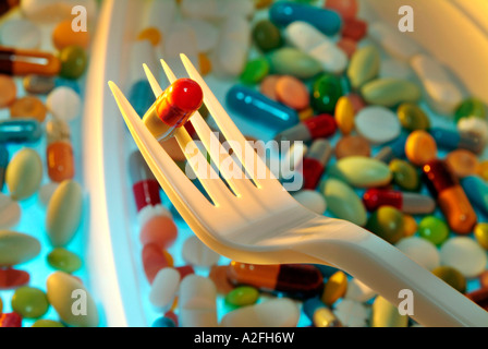 Different colorful pills in plastic packs - blisters stacked. Global ...