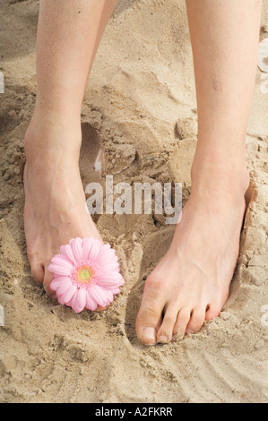 Flower between toes Stock Photo - Alamy