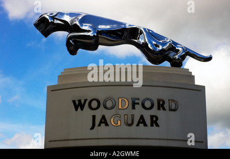 Iconic leaping Jaguar logo sculpture outside a showroom in Woodford ...