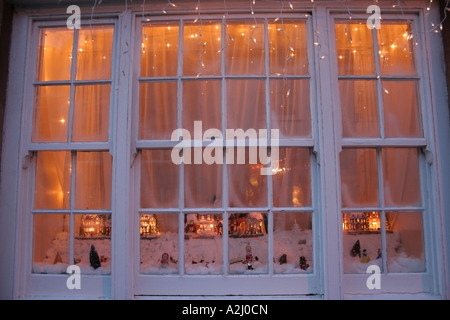 Shop window during the Dunster Candlelight festival Stock Photo - Alamy
