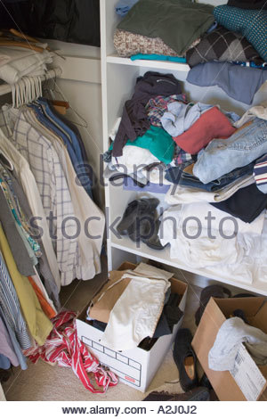 Clothing and boxes in messy fashion buyerís office Stock Photo ...