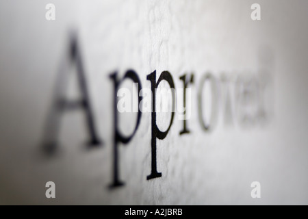 the word approved printed on to texture paper Stock Photo - Alamy