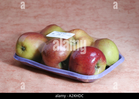 Supermarket apples packed with foil and label Stock Photo - Alamy