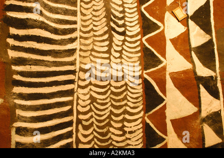 geometrical wallpaintings in a traditional hut of the Bemba people ...