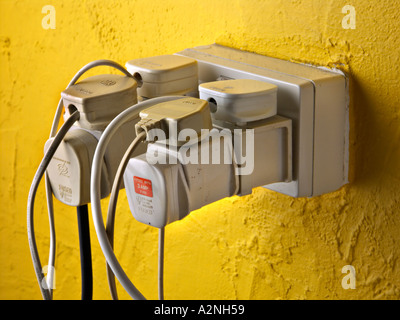 A dangerously overloaded electrical socket Stock Photo - Alamy