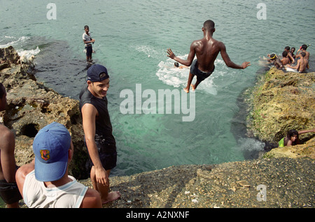 Cuban boys swimming at the Malecon Stock Photo: 4354757 - Alamy