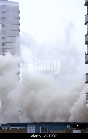 Tower block demolition using controlled explosives with tower ...