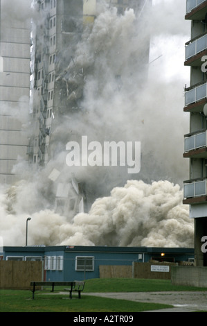 Tower block demolition using controlled explosives with tower ...