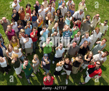 people crowd holding and using phones. modern 5g technology ...