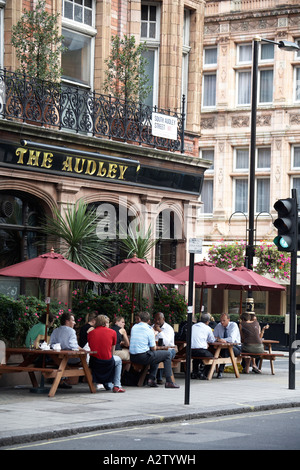 People drinking and talking outside The Audley pub in Mayfair London W1 ...
