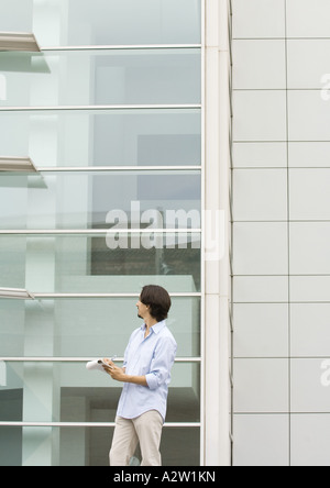 Medium shot man drawing architectural project Stock Photo - Alamy
