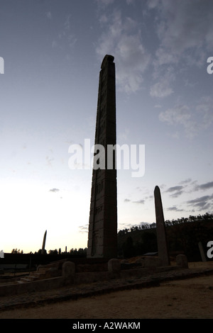 Solid stone carved stelae in silhouette against the sunset Aksum or ...