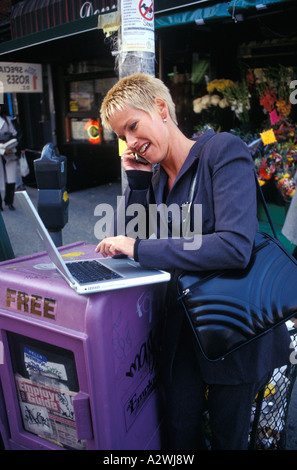Young adult woman smiling, communicating with a friend in a cafe ...