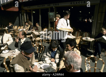 cafe scene in paris 1985 tables in the street Stock Photo - Alamy