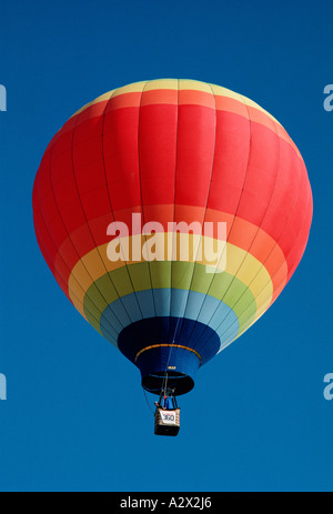 Flying hot air balloon in the air Stock Photo - Alamy