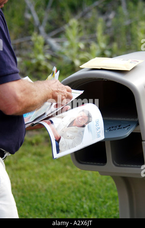 US mail box collecting mail from the mailbox Stock Photo - Alamy