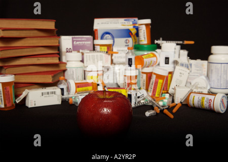 fruit apple book drug medicine Stock Photo - Alamy