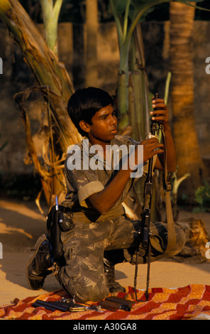 8 year old tamil tiger child soldier in Tamil headquarters Jaffna Peninsula Stock Photo - Alamy