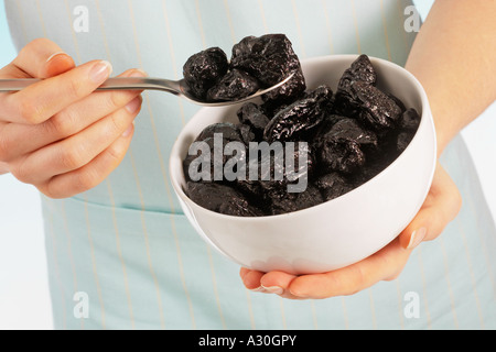 WOMAN EATING PRUNES Stock Photo: 30204059 - Alamy