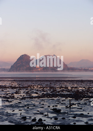 Dumbarton Rock and Dumbarton castle at low tide from West Ferry on the ...